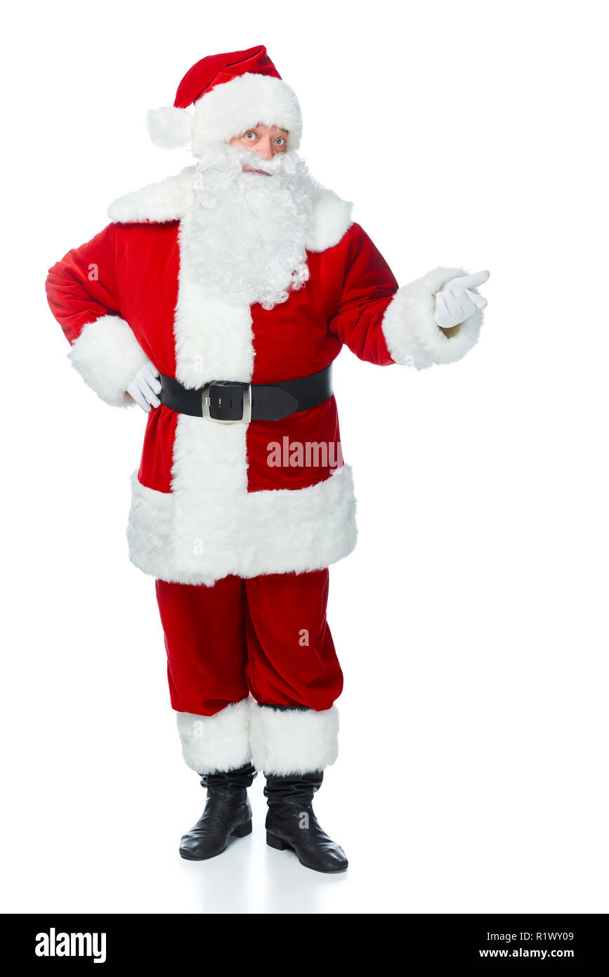 surprised santa claus showing something isolated on white Stock Photo ...