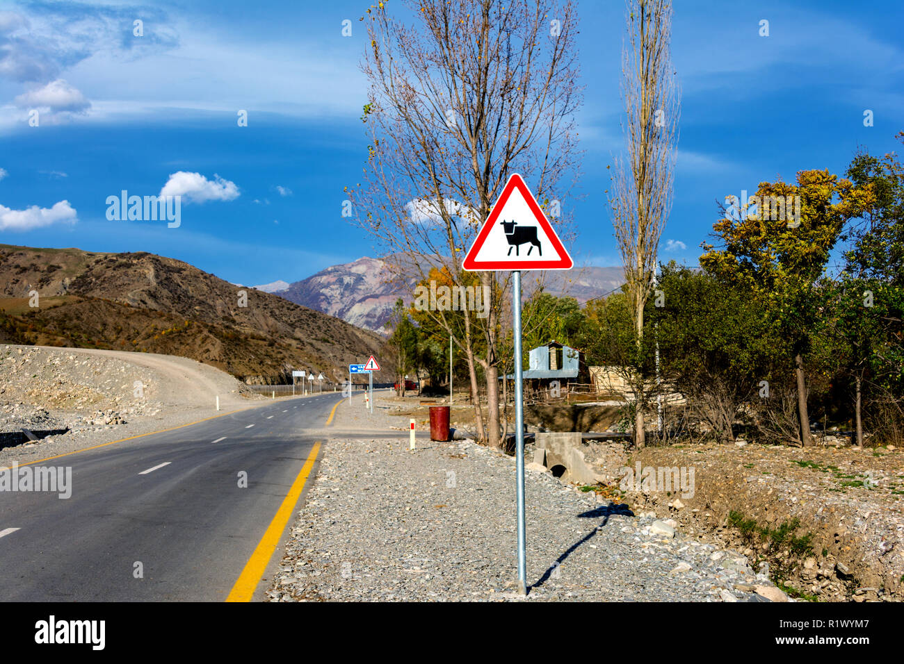 Animals on the road, warning sign, countryside Stock Photo - Alamy