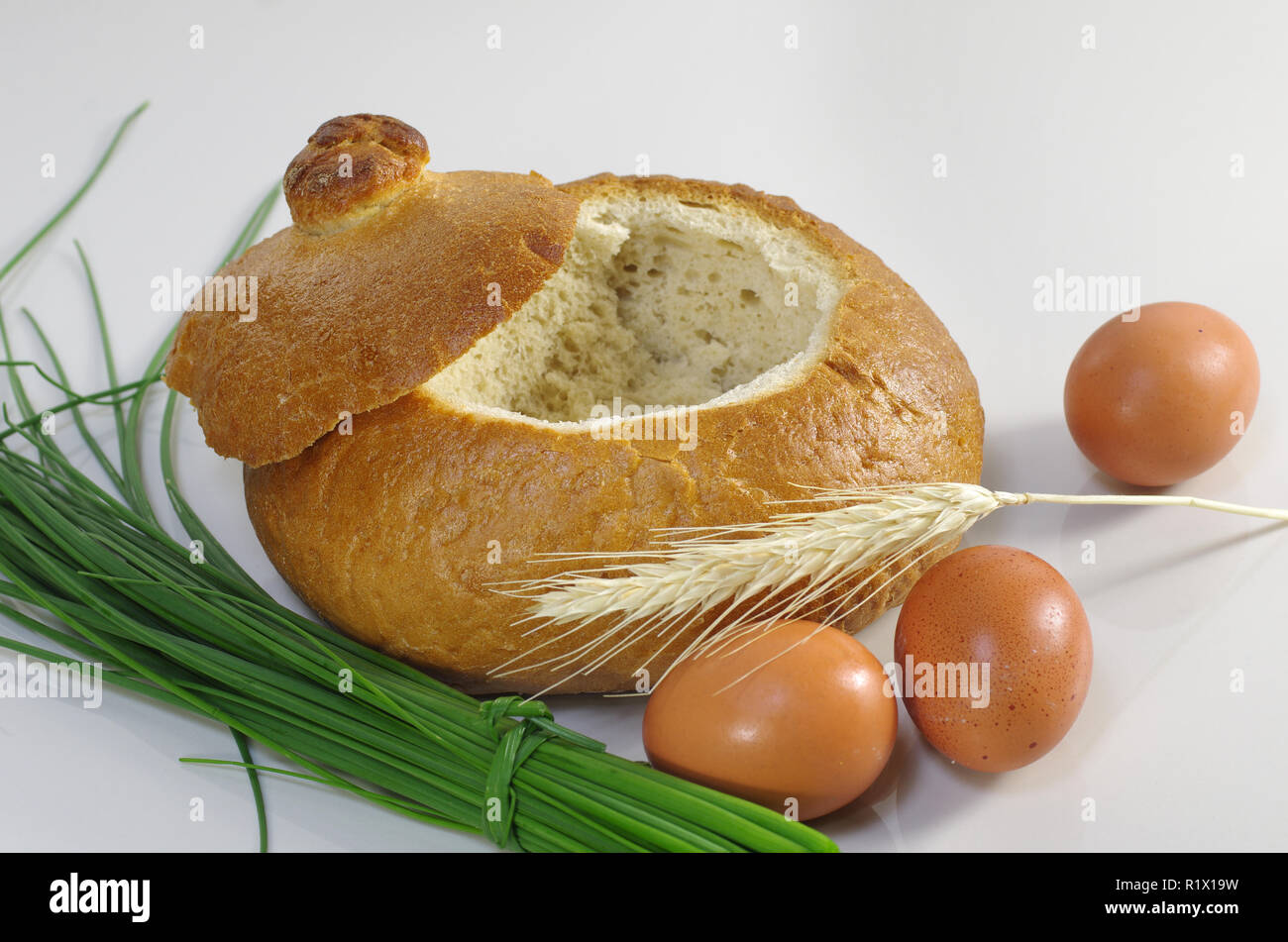 empty bread bowl with a lid on white background Stock Photo - Alamy