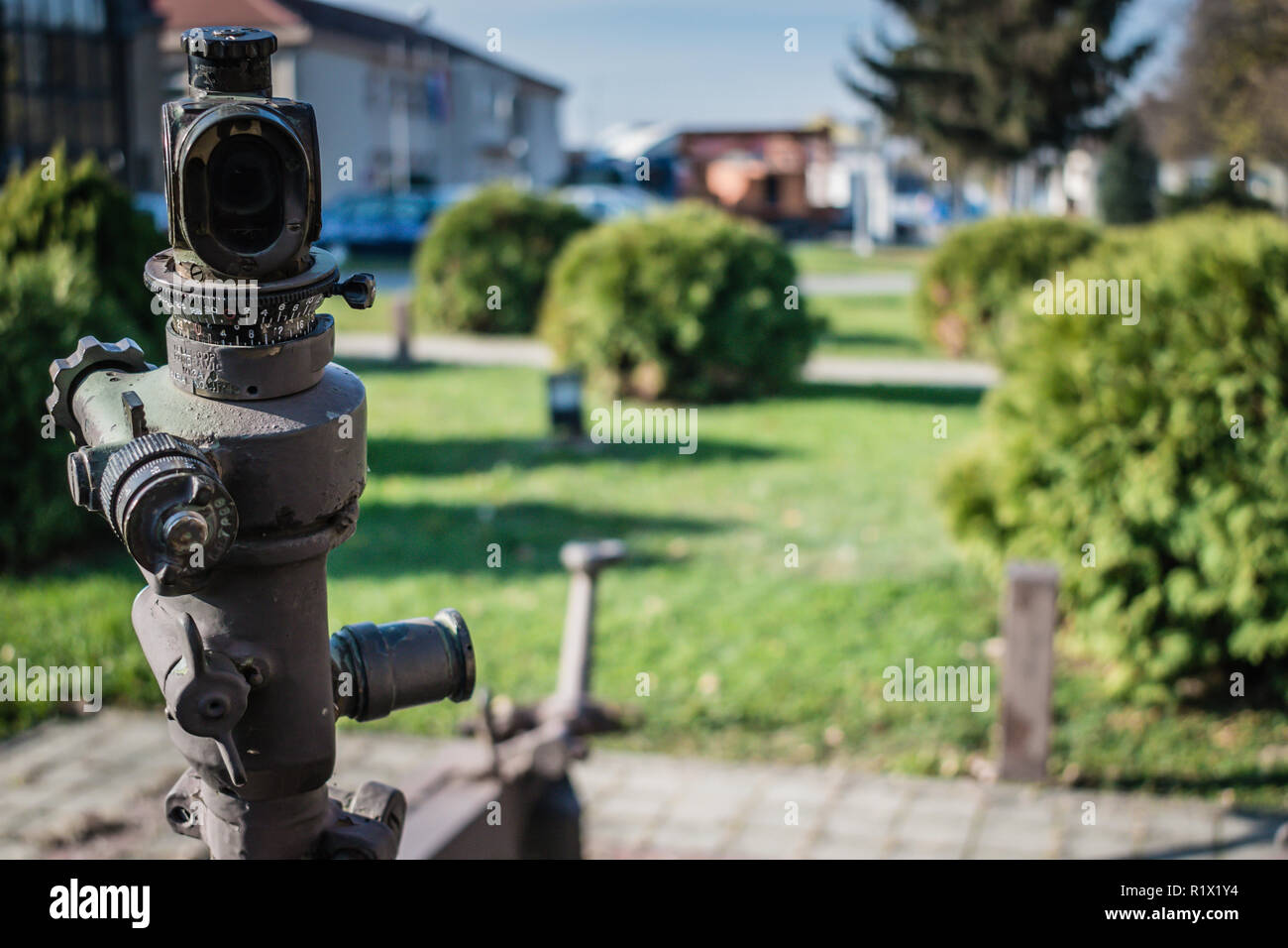 Army scope of short barrel canon in the city background Stock Photo - Alamy