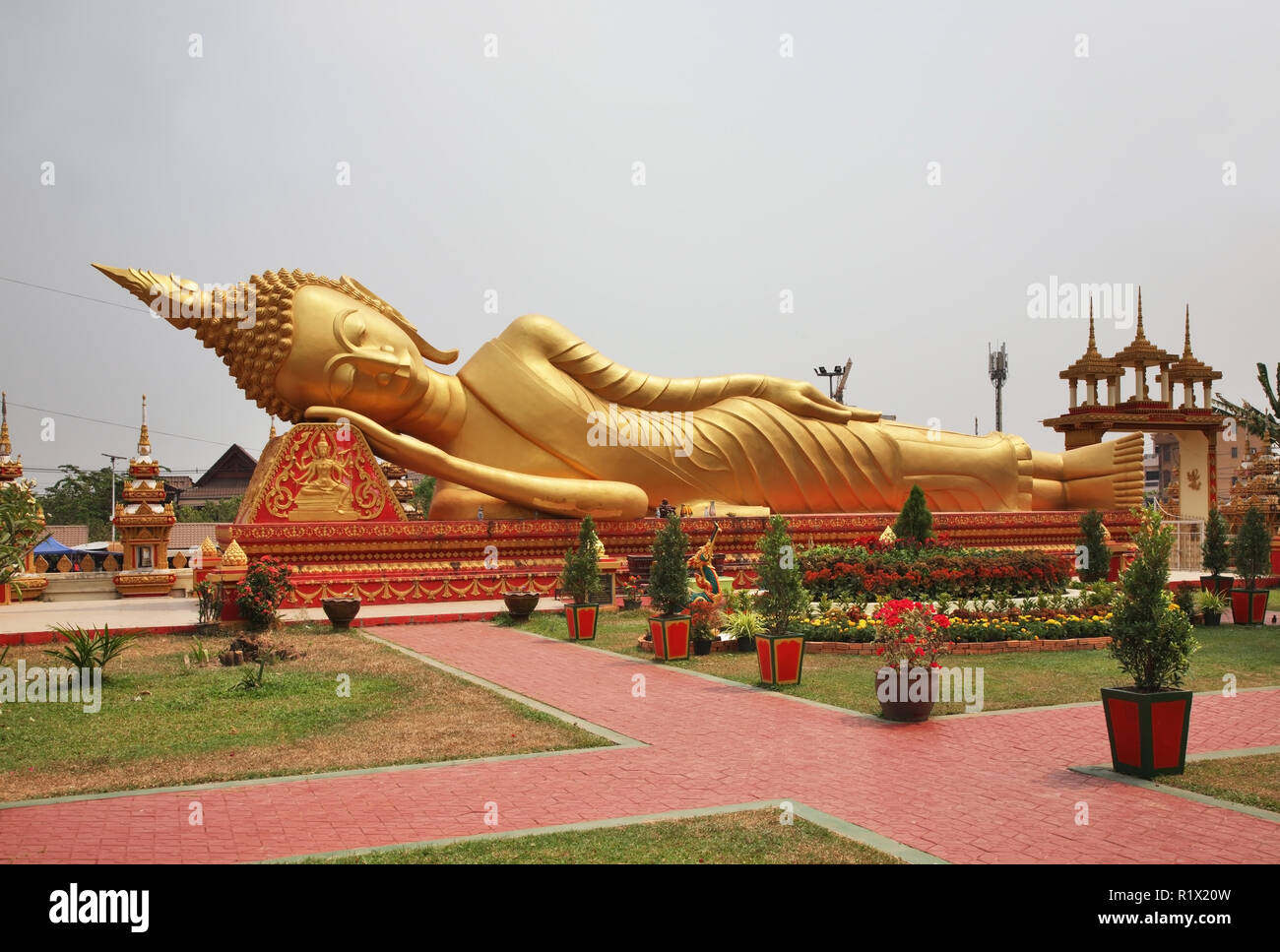 Reclining Buddha at Wat That Luang Tai temple in Vientiane. Laos Stock Photo - Alamy