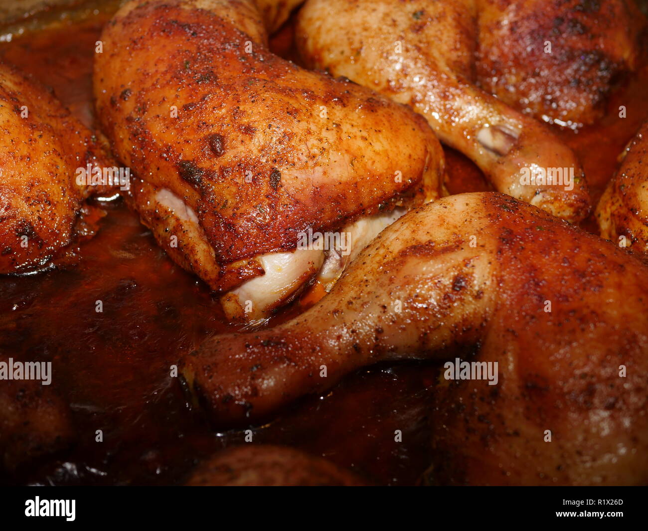 roast chicken legs on plate Stock Photo - Alamy