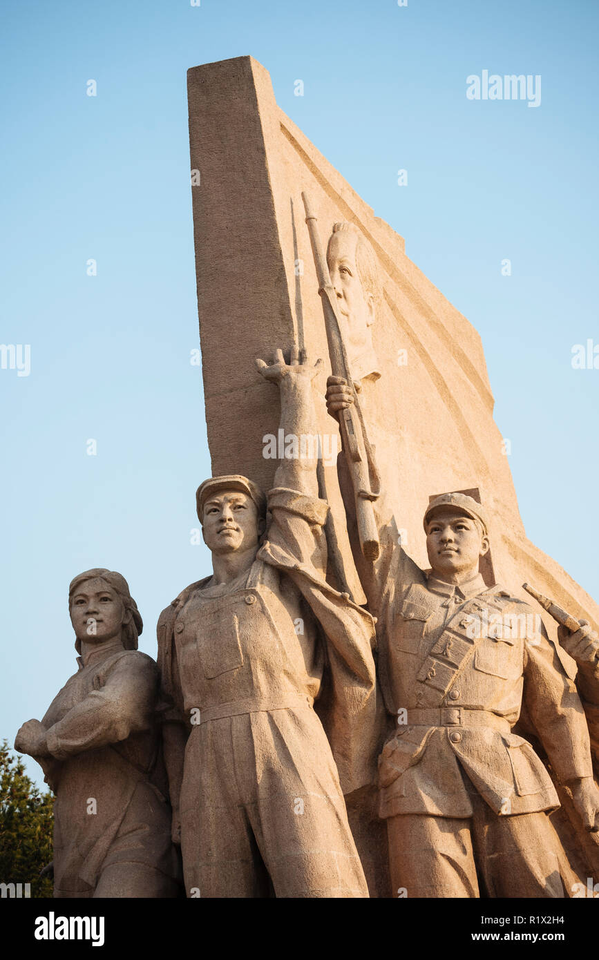 Monument showing communist revolutionary heroes in front of Mao's ...