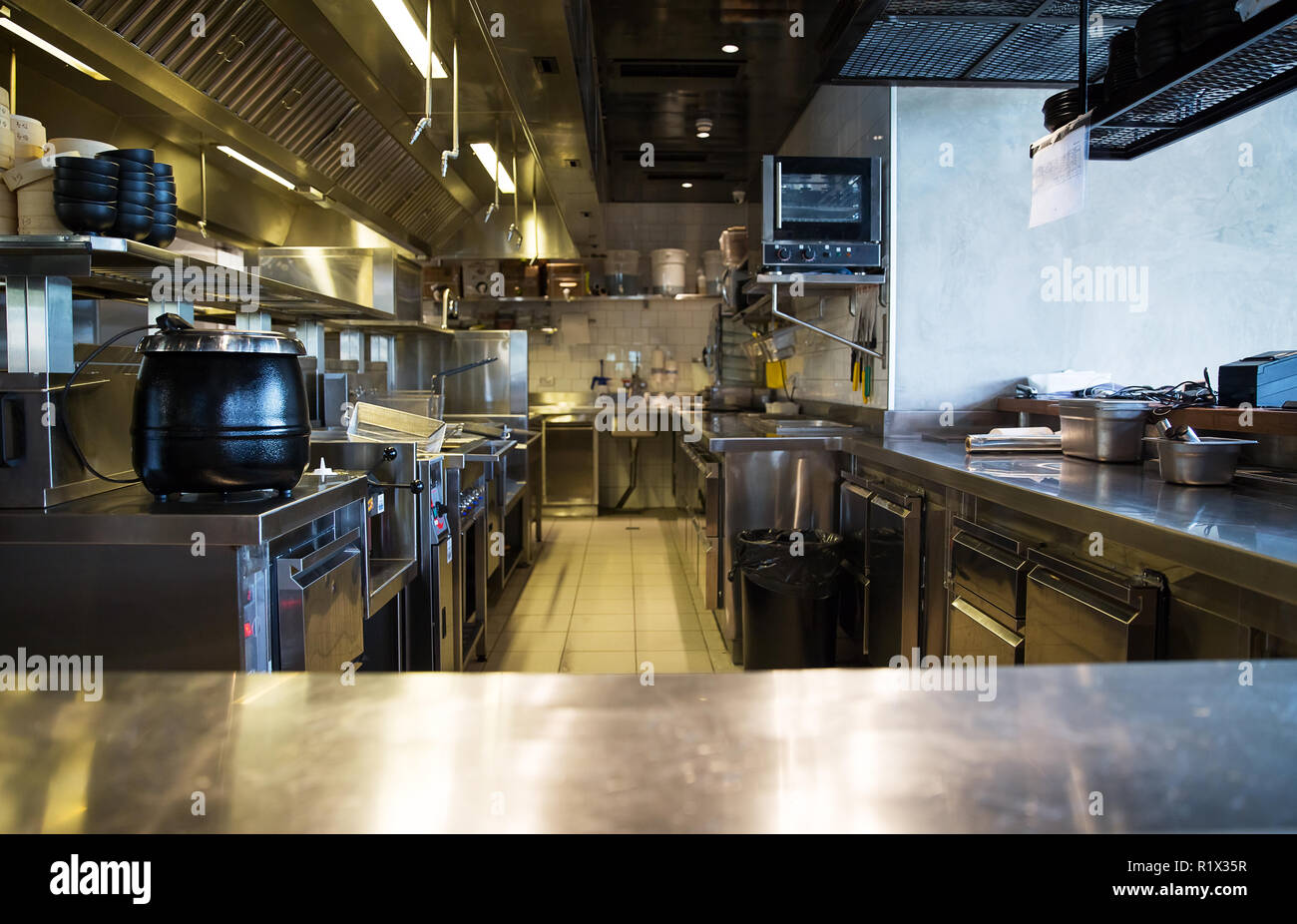 Professional kitchen, view counter in stainless steel Stock Photo - Alamy