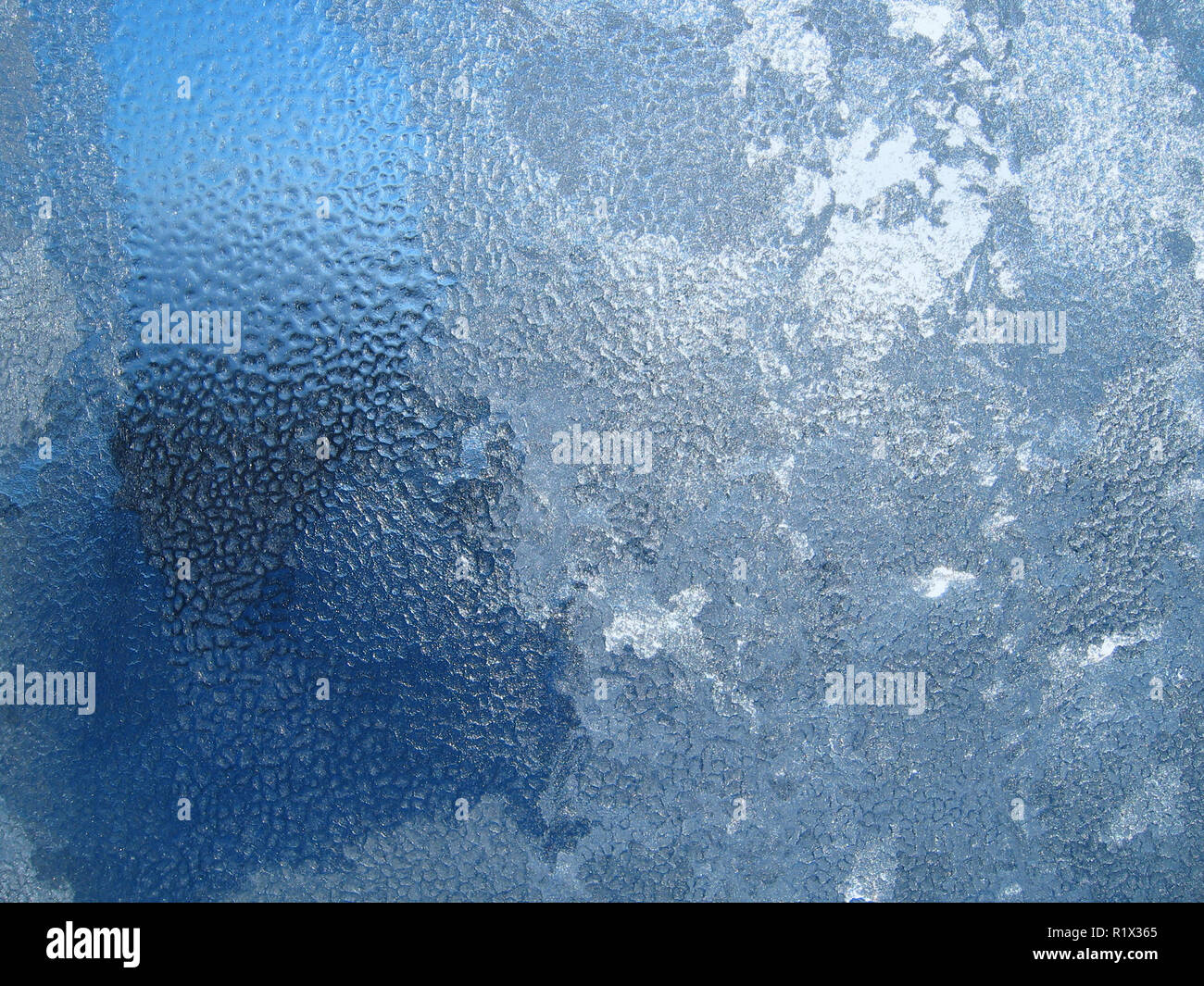Ice pattern on winter window Stock Photo - Alamy