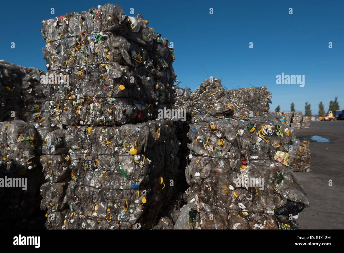 Pressed plastic waste cubes for recycling at the Mixed-waste processing ...