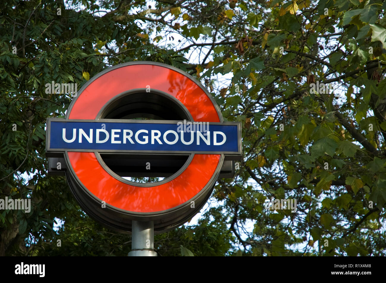 A classic red "Underground" train station sign, London, England Stock ...