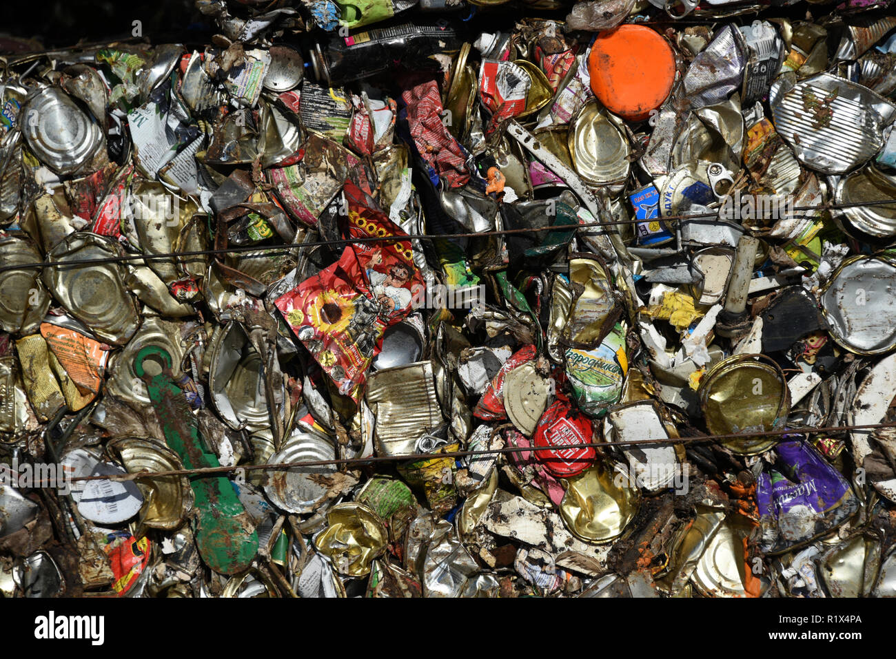 Pressed cubes of cans for recycling at the waste segregation station in ...