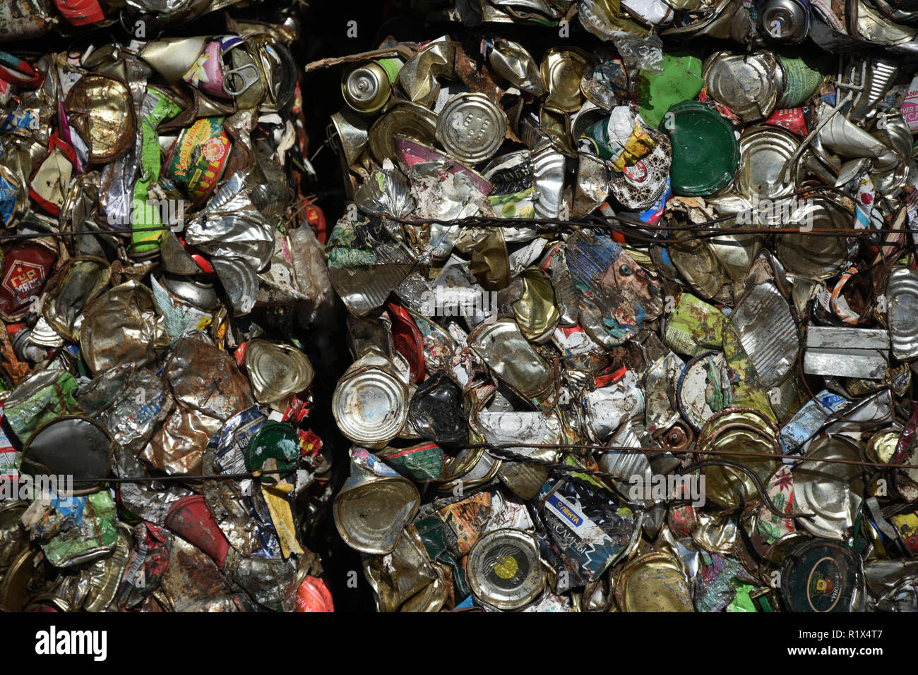 Pressed cubes of cans for recycling at the waste segregation station in ...