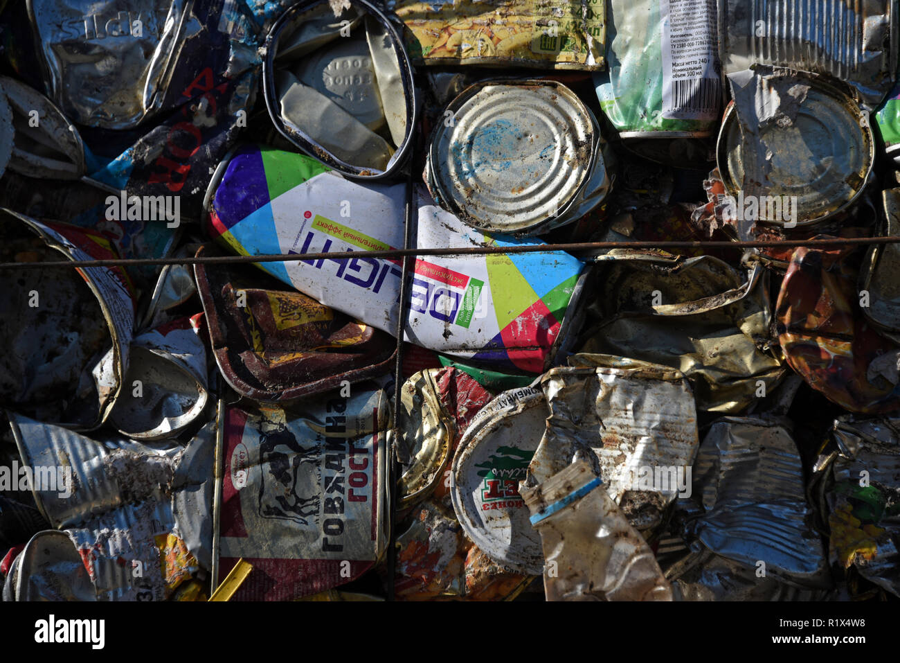 Pressed cubes of cans for recycling at the waste segregation station in ...
