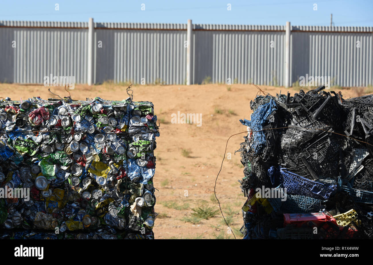 Pressed cubes of cans for recycling at the waste segregation station in ...