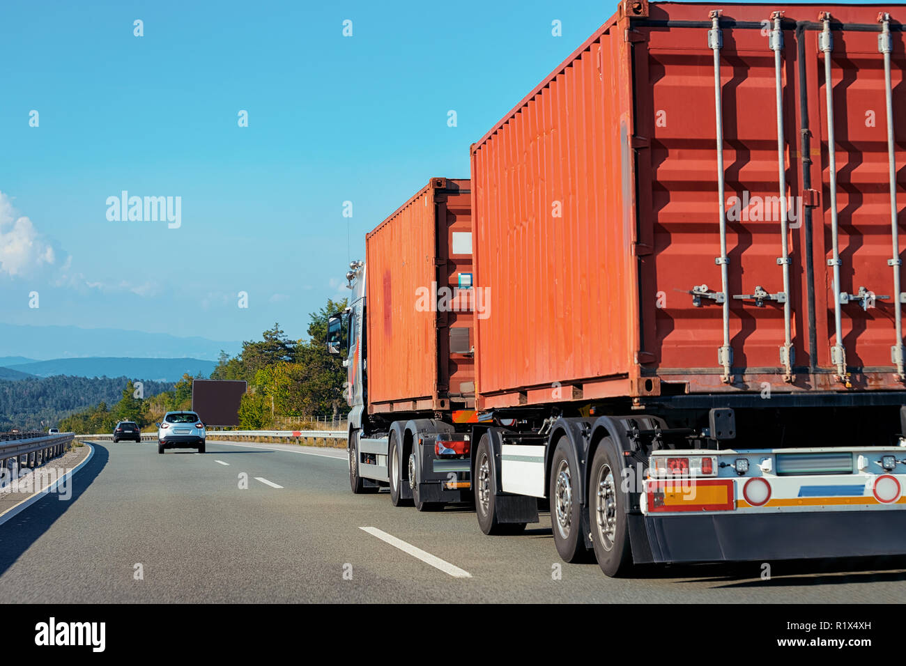 Red Truck at the alphalt road of Poland. Lorry transport delivering ...