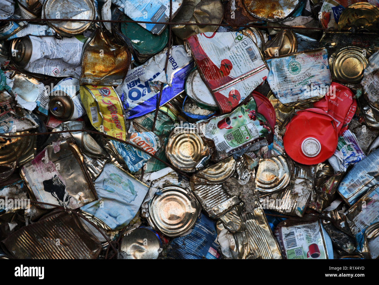 Pressed cubes of cans for recycling at the waste segregation station in ...