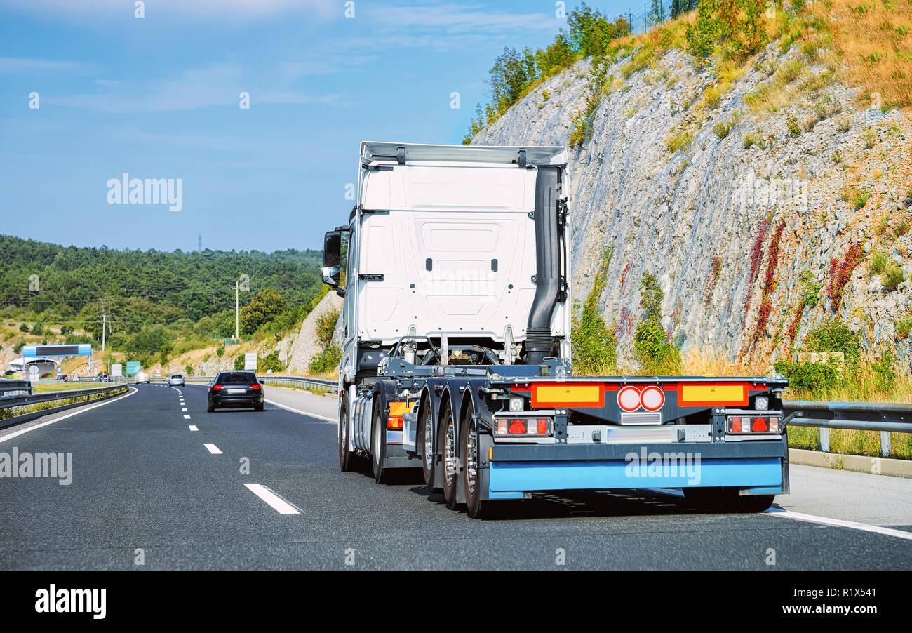 Truck without trailer box on the highway asphalt road of Poland. Truck ...
