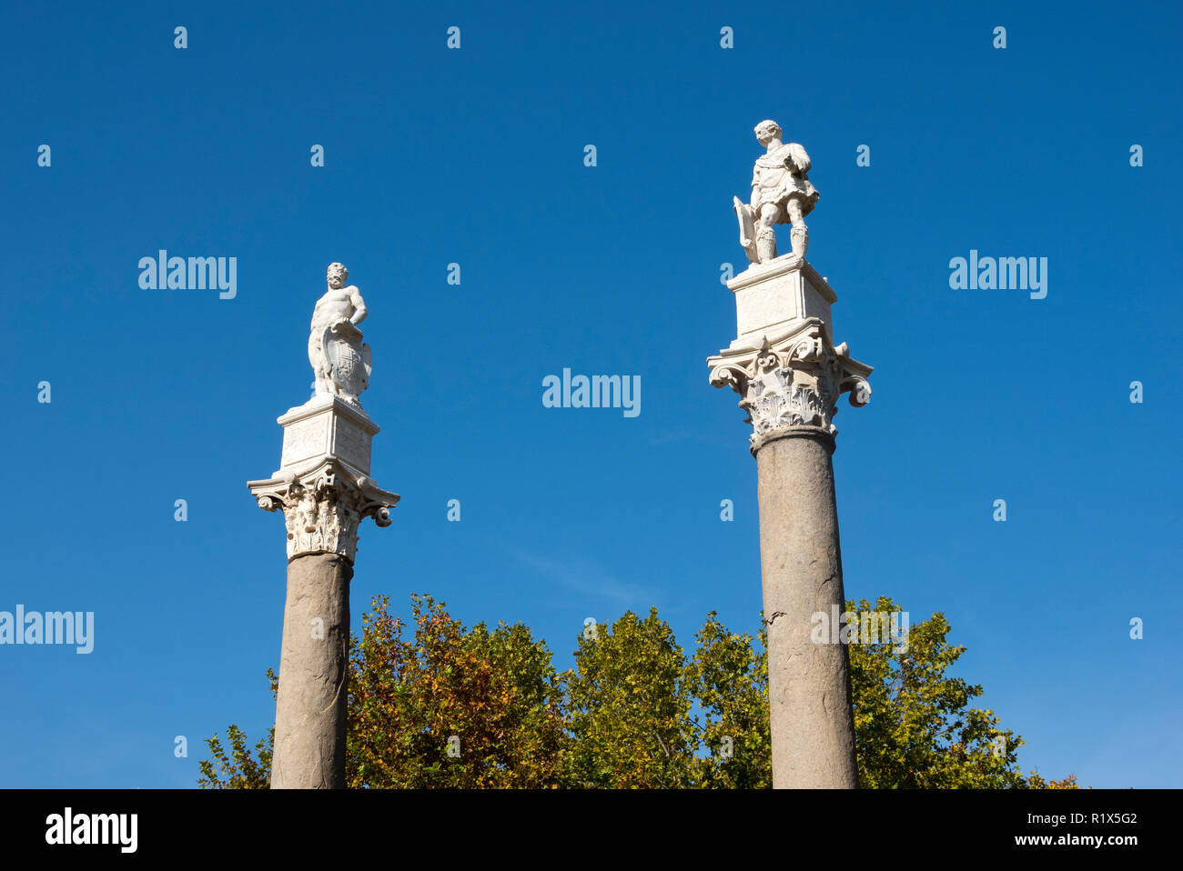 Statues at the south end of Alameda de Hercules in Seville, Spain ...
