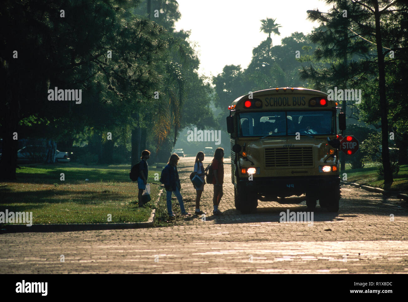 Students boarding school bus hi-res stock photography and images - Alamy