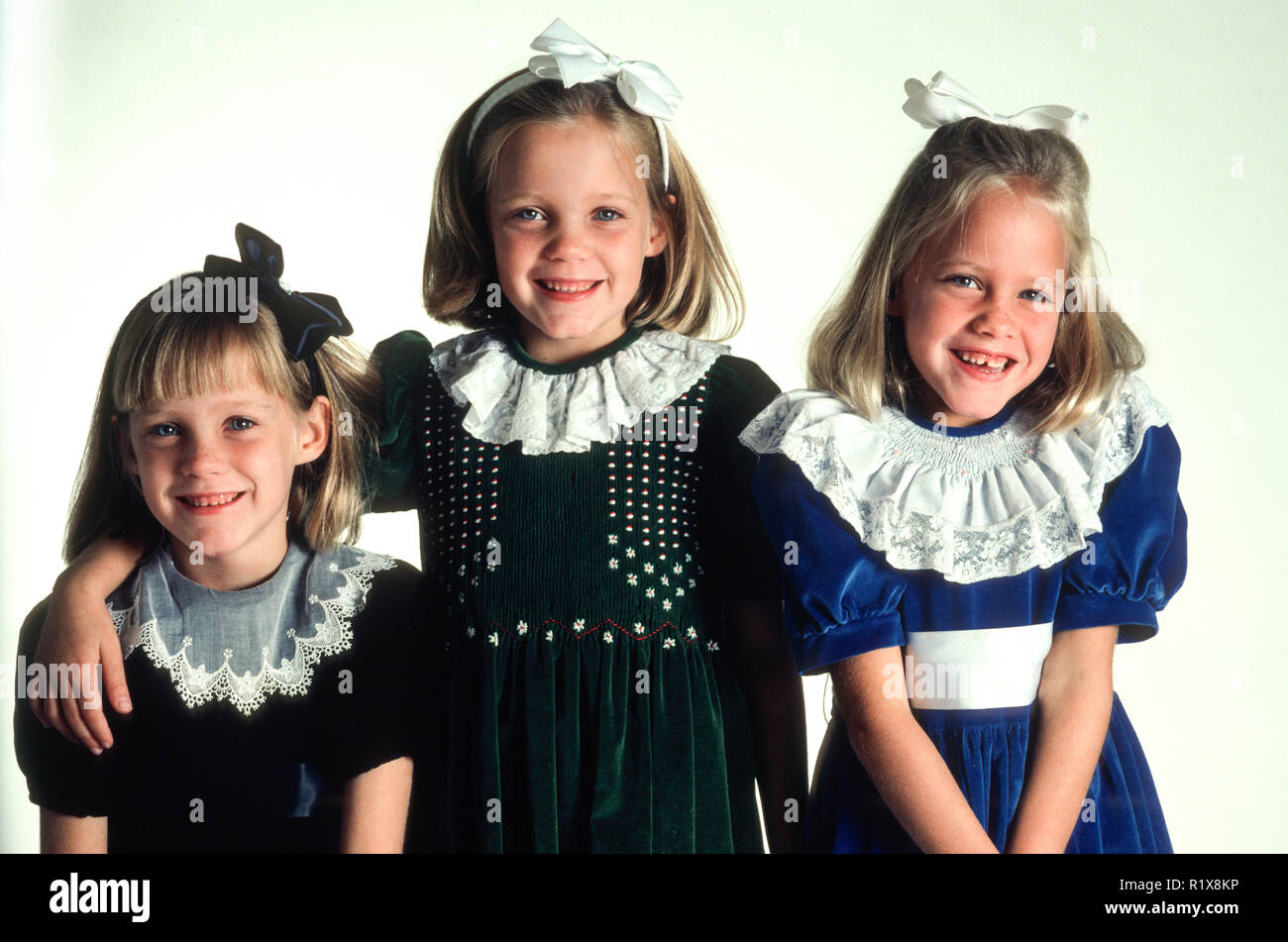 1990s, Triplet girls Pose for a portrait, USA Stock Photo - Alamy