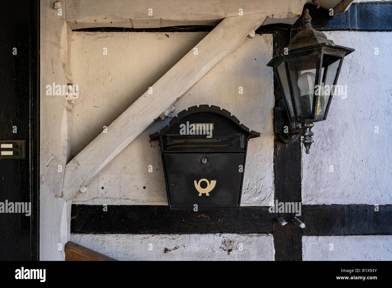 Old lantern and mailbox on the wall Stock Photo - Alamy