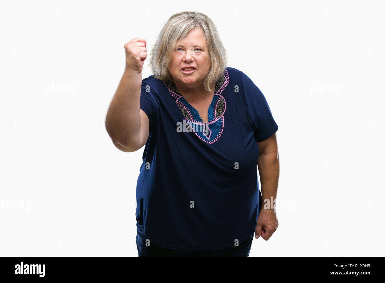 Senior plus size caucasian woman over isolated background angry and mad ...