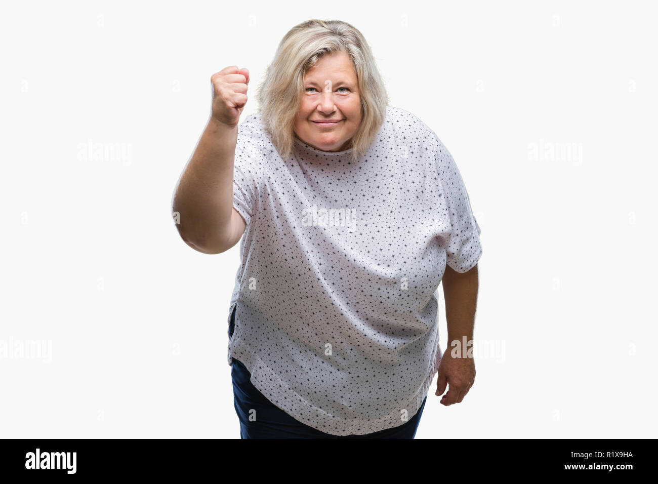 Senior plus size caucasian woman over isolated background angry and mad ...