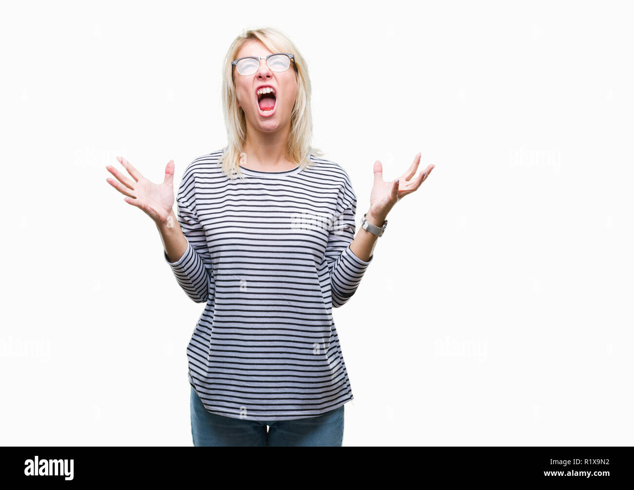 Young beautiful blonde woman wearing glasses over isolated background ...