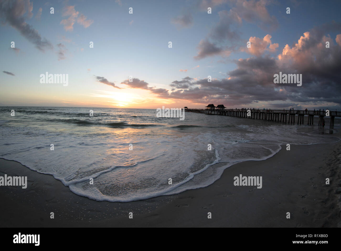 A scenic view of the Gulf of Mexico near sunset from a Florida beach ...