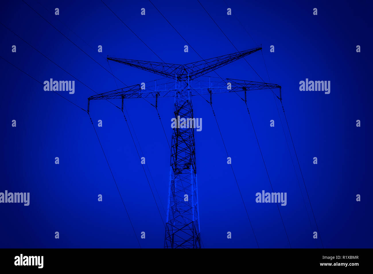 an image of a metal tower of Power Lines Stock Photo - Alamy