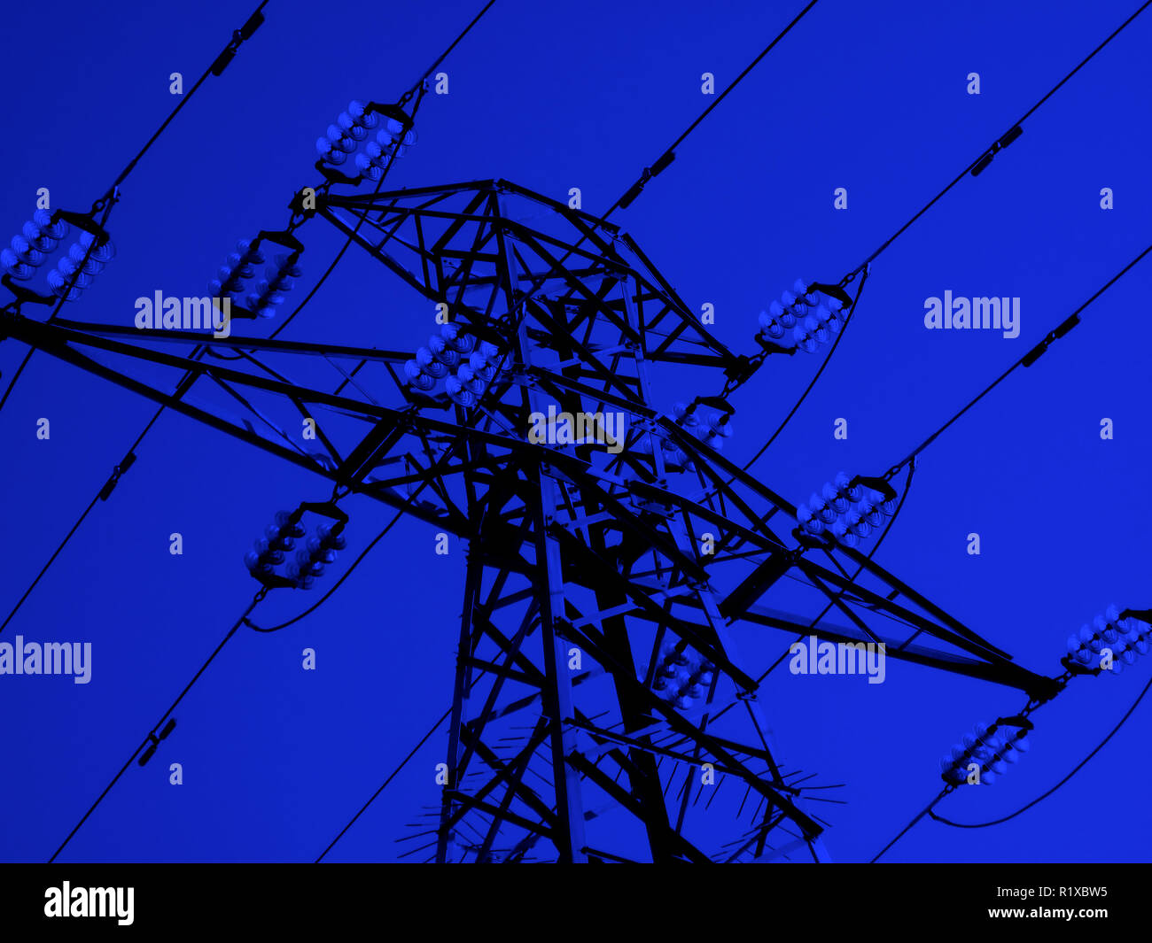 an image of a metal tower of Power Lines Stock Photo - Alamy