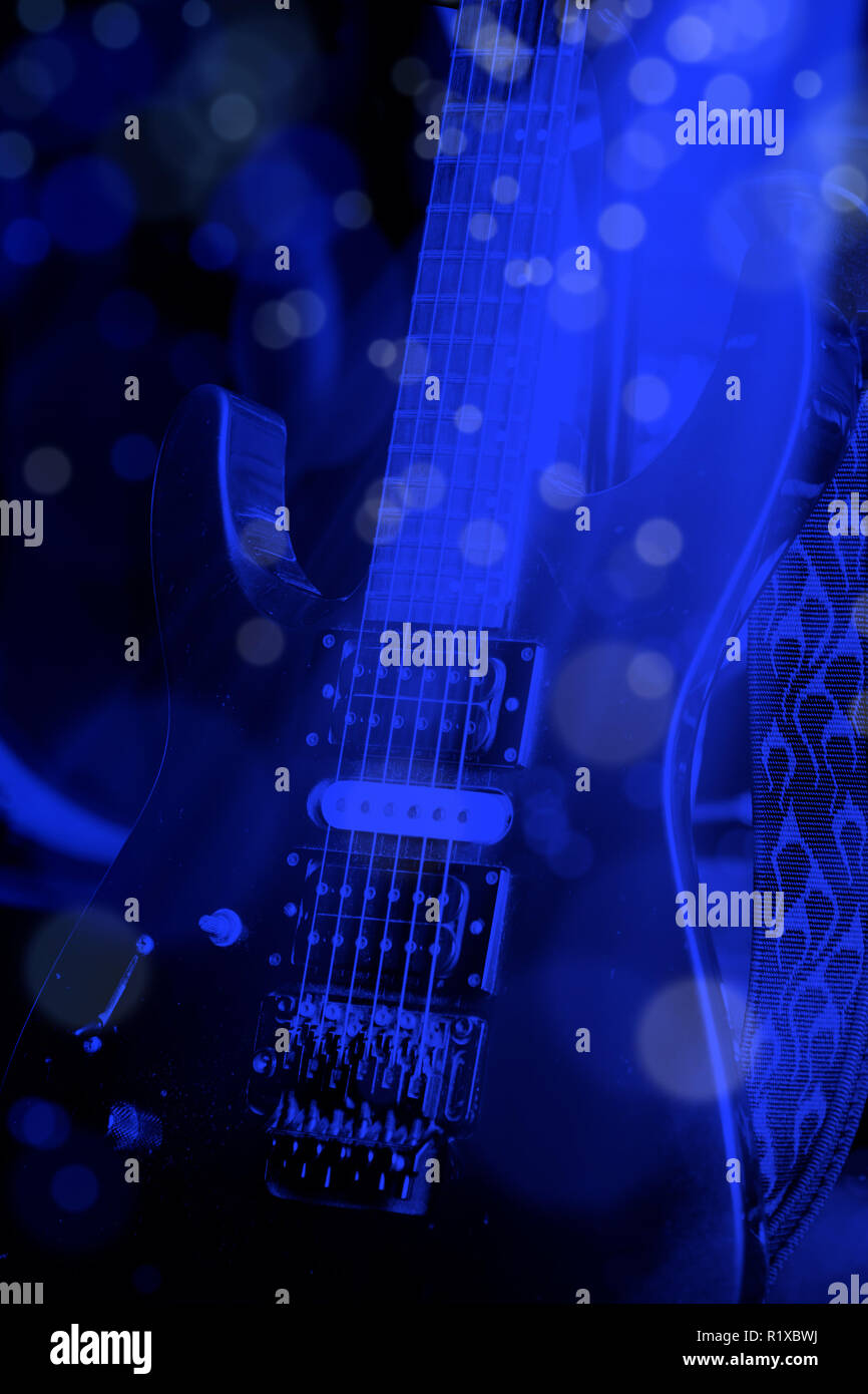 close up shot of a guitar with light beam Stock Photo - Alamy
