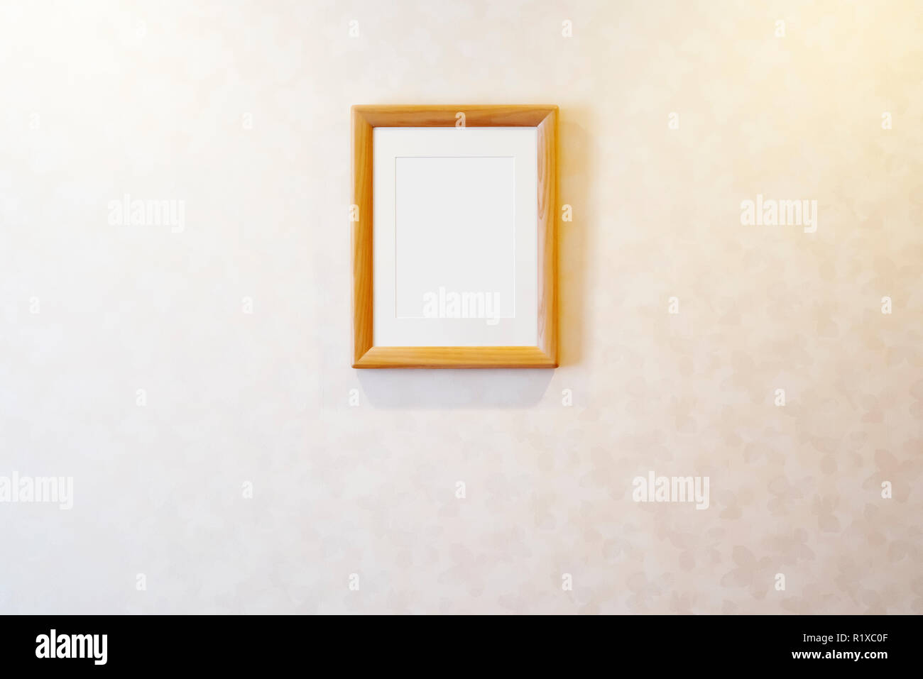 Blank wooden picture frame on the wall, rectangular photo frame with ...