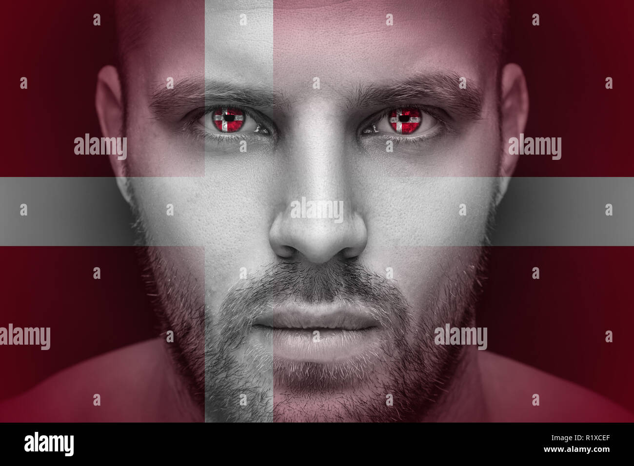 Portrait of a young serious man, in whose eyes the reflected national ...