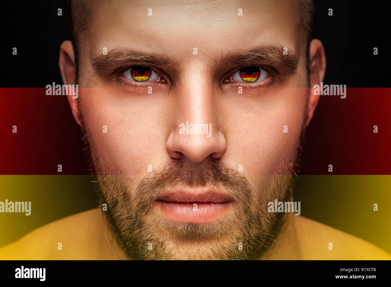 Portrait of a young serious man, in whose eyes the reflected national ...
