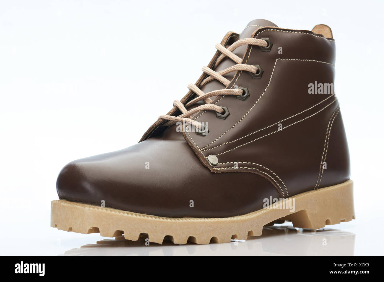 Brown leather color shoe angle view isolated Stock Photo - Alamy
