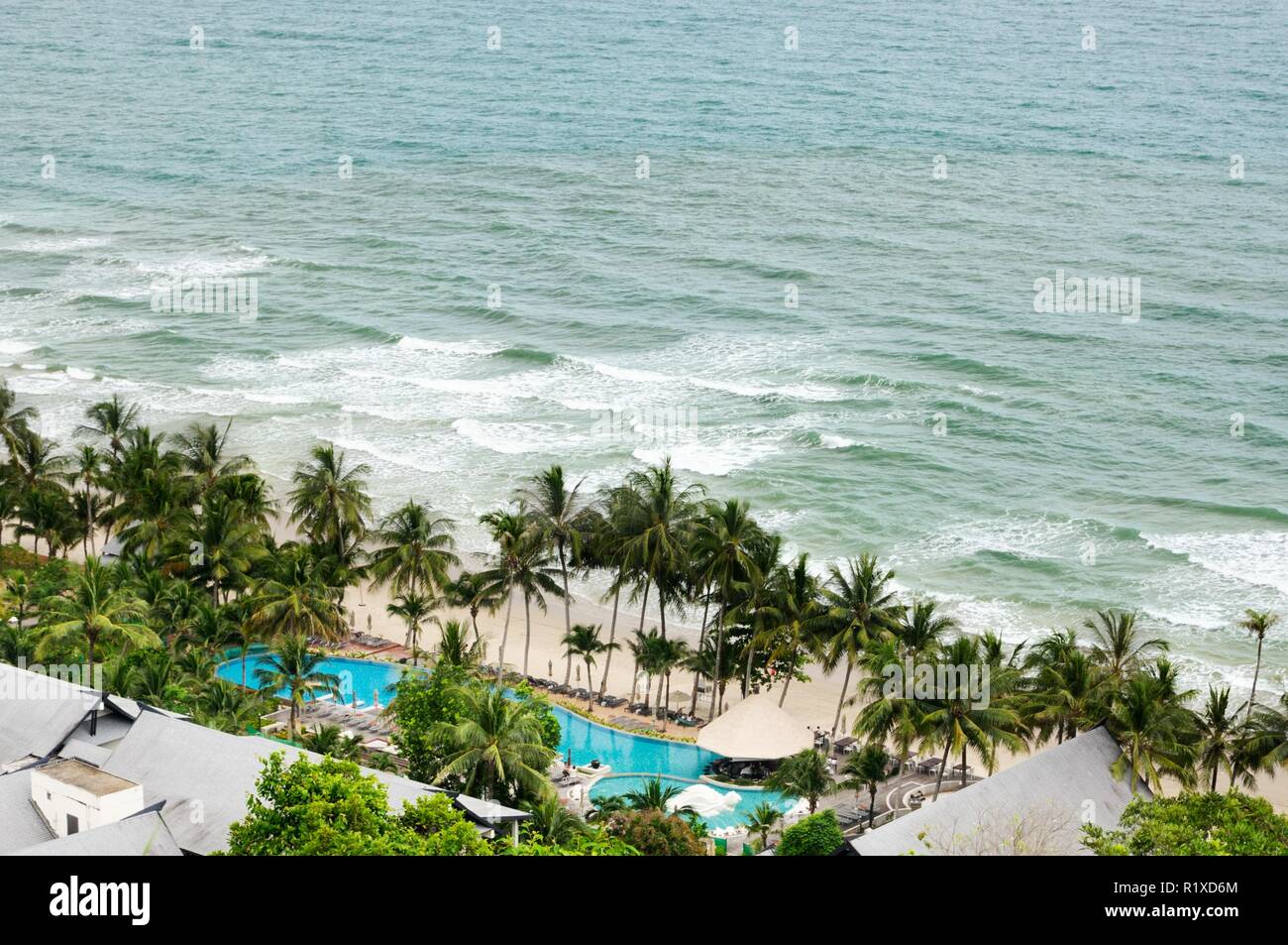 Tropical beach house coconut trees hi-res stock photography and images ...