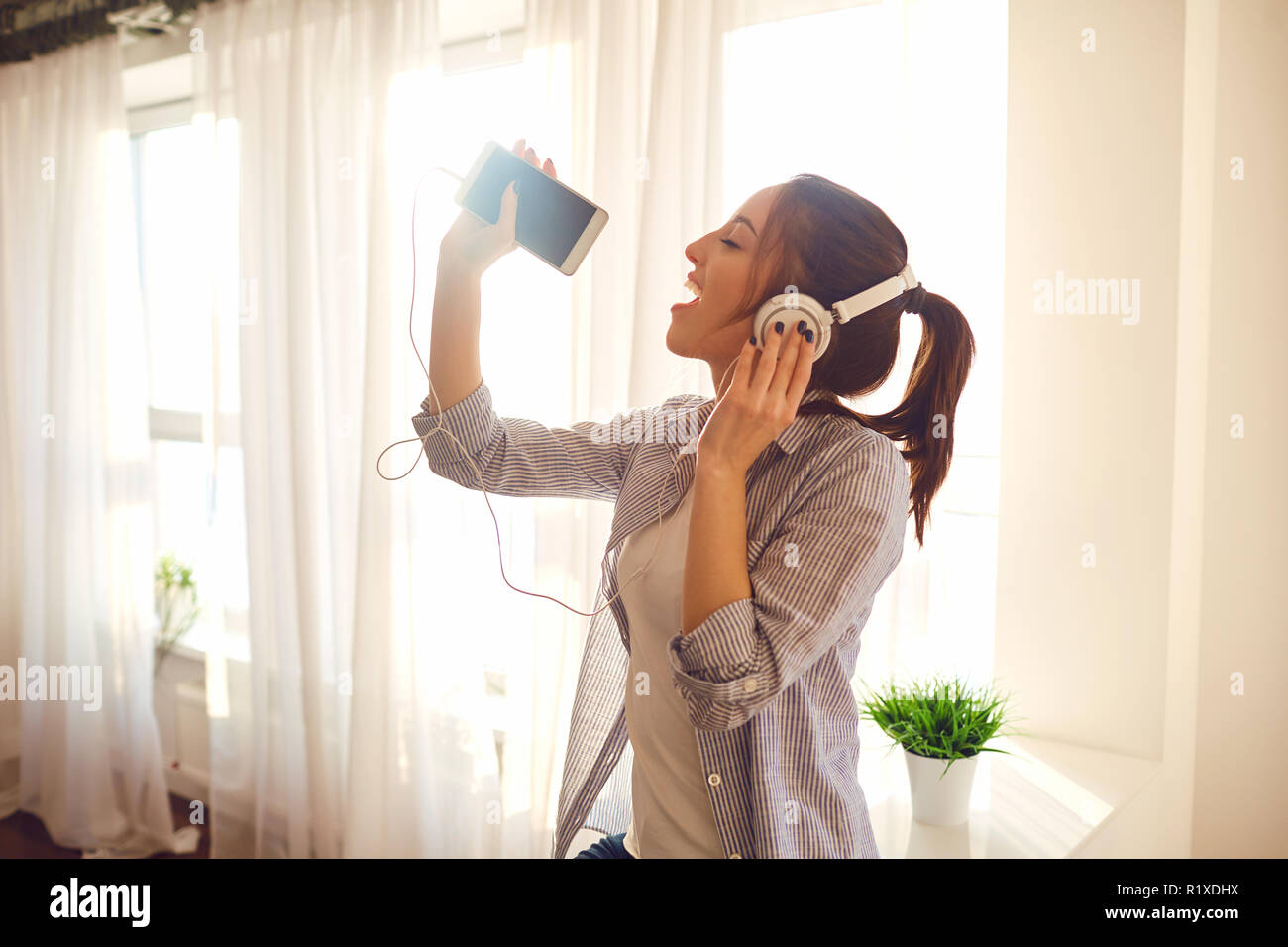 Girl window interior hi-res stock photography and images - Alamy