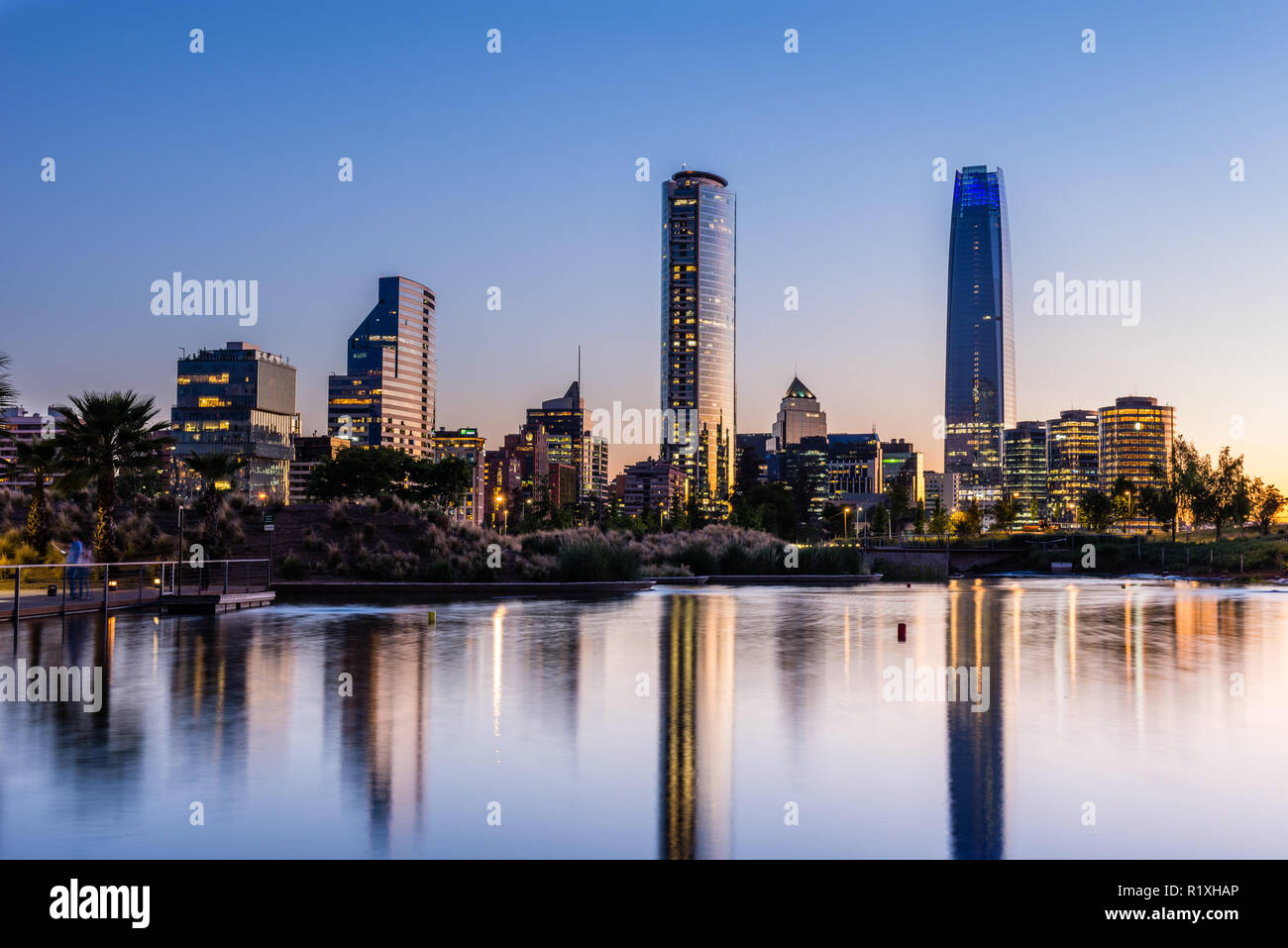 Titanium and SKy Costanera by nightfall froma Parque Bicentenario. The ...