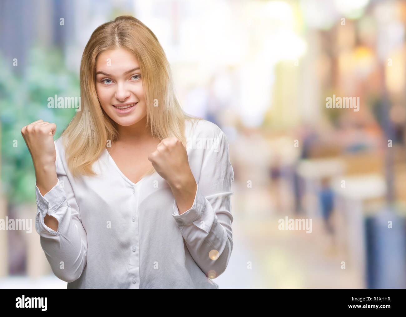 Young caucasian woman over isolated background very happy and excited ...