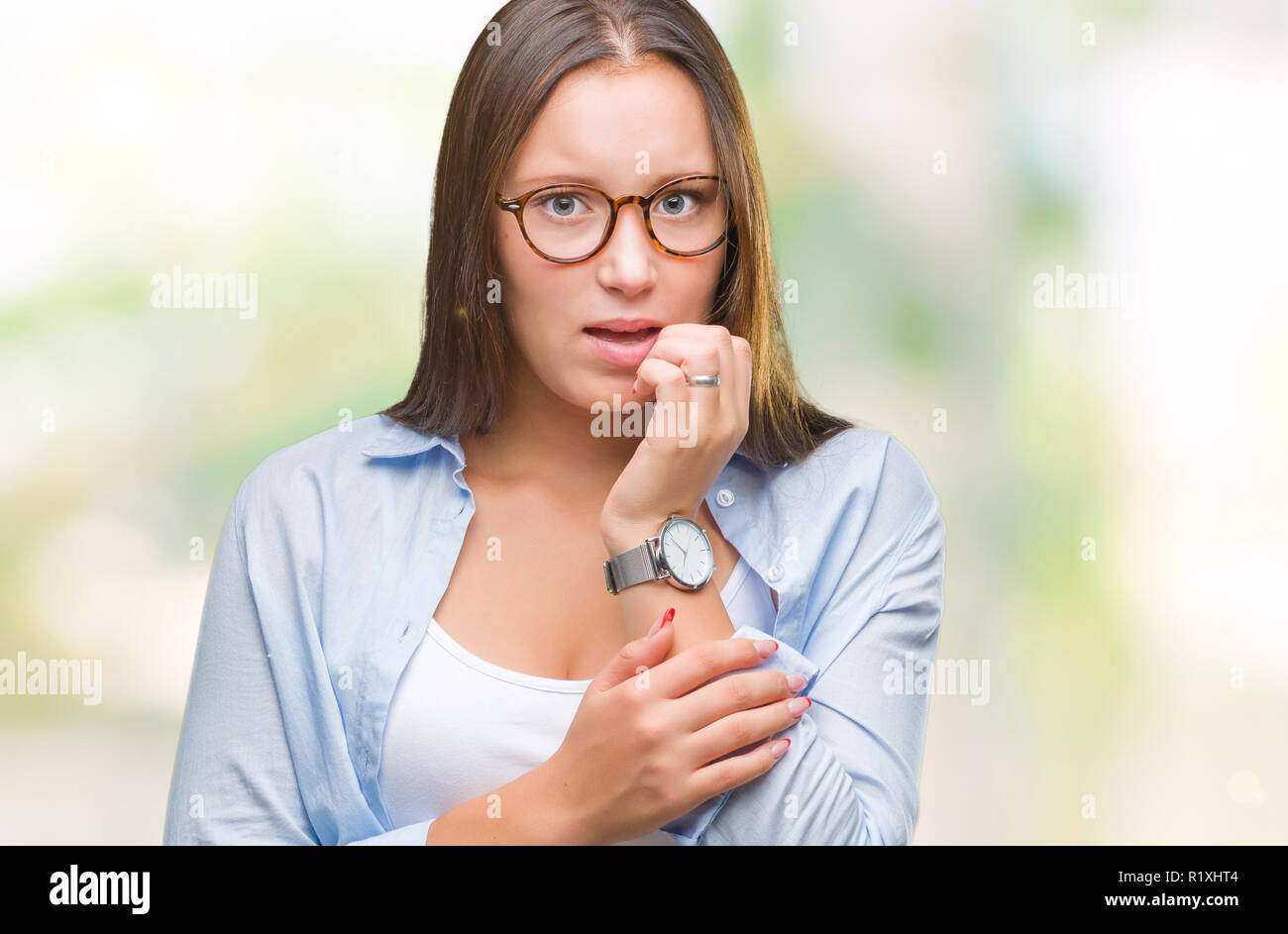 Young caucasian beautiful business woman wearing glasses over isolated ...