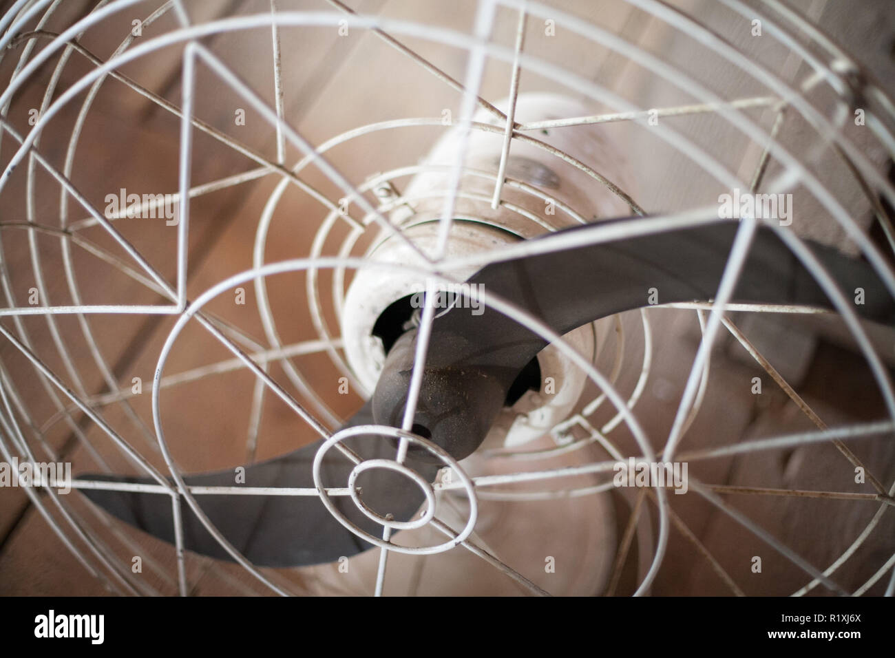old mid-century metal fan on a wooden farm table, vintage farmhouse fan ...