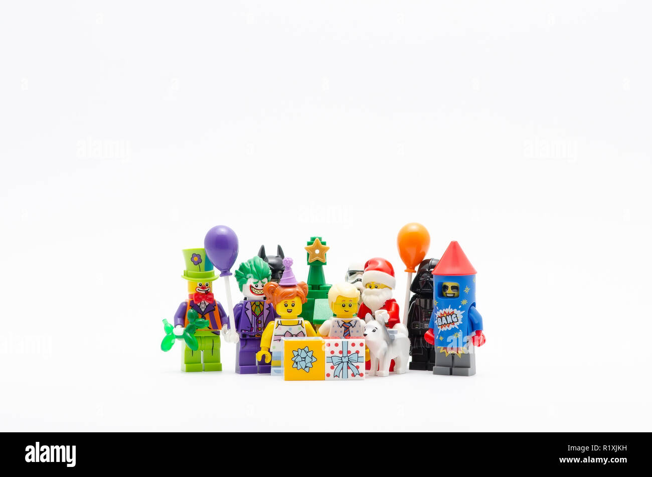 lego minifigures with christmas tree and gift box. Lego minifigures are ...