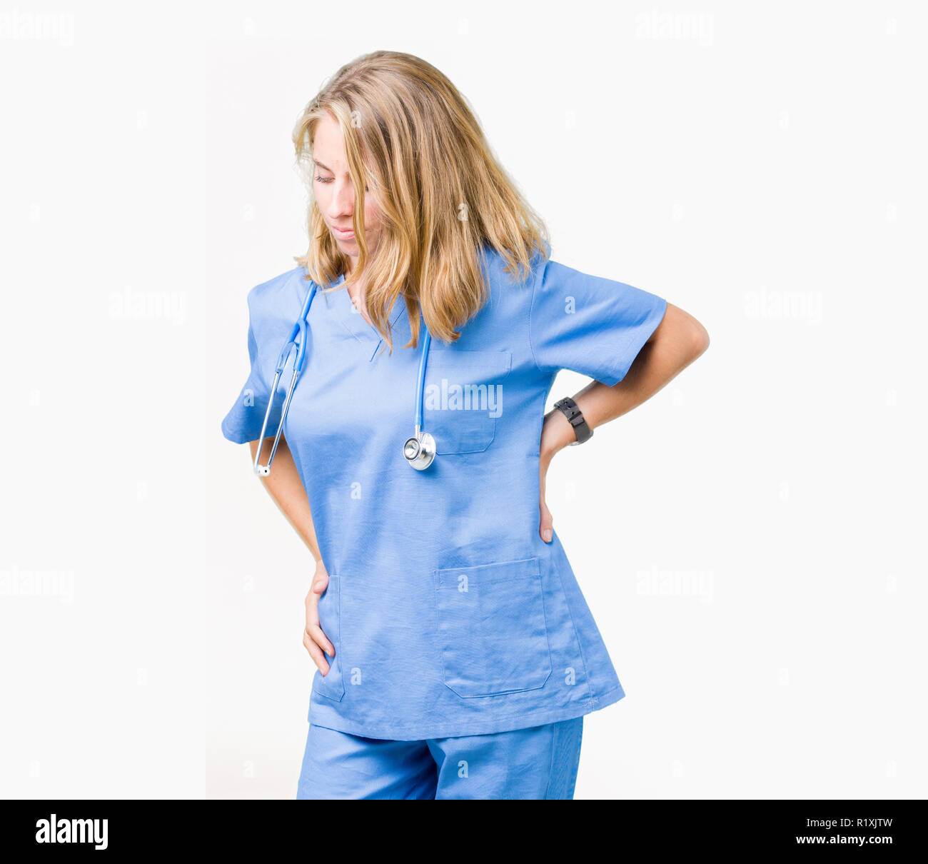 Beautiful young doctor woman wearing medical uniform over isolated ...
