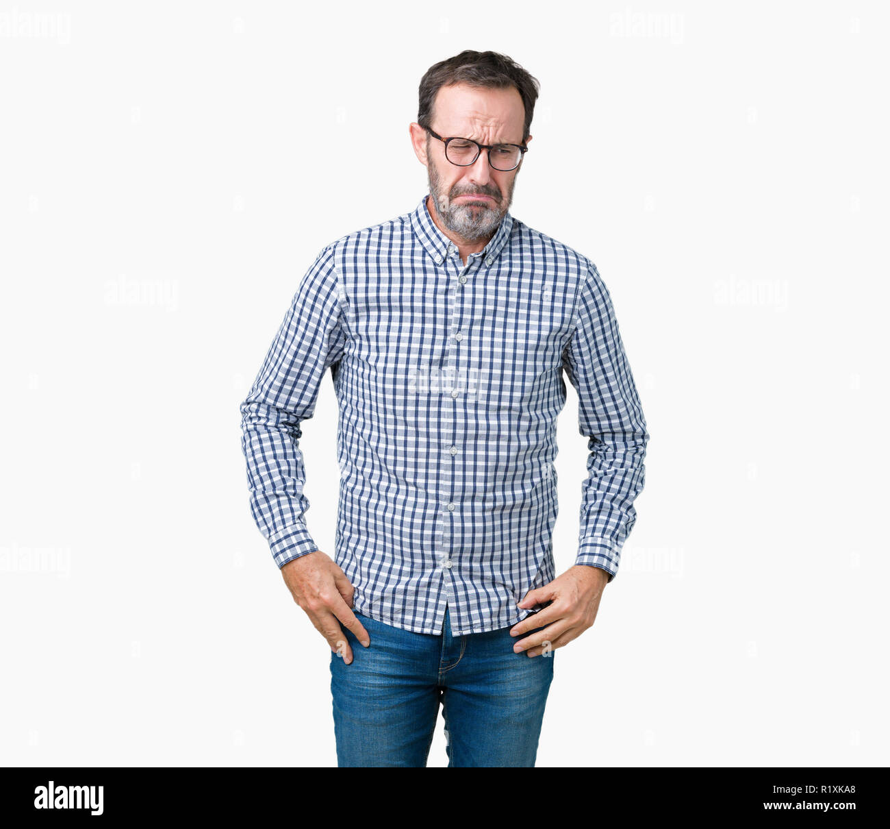 Handsome middle age elegant senior man wearing glasses over isolated ...
