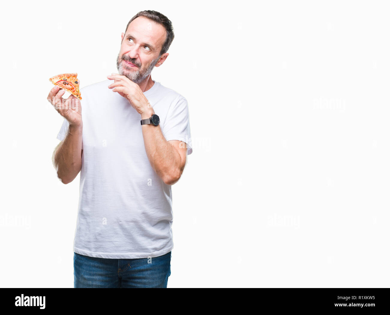 Middle age hoary senior man eating pizza slice over isolated background ...