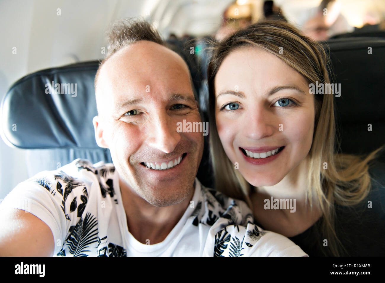 Couple inside plane hi-res stock photography and images - Alamy