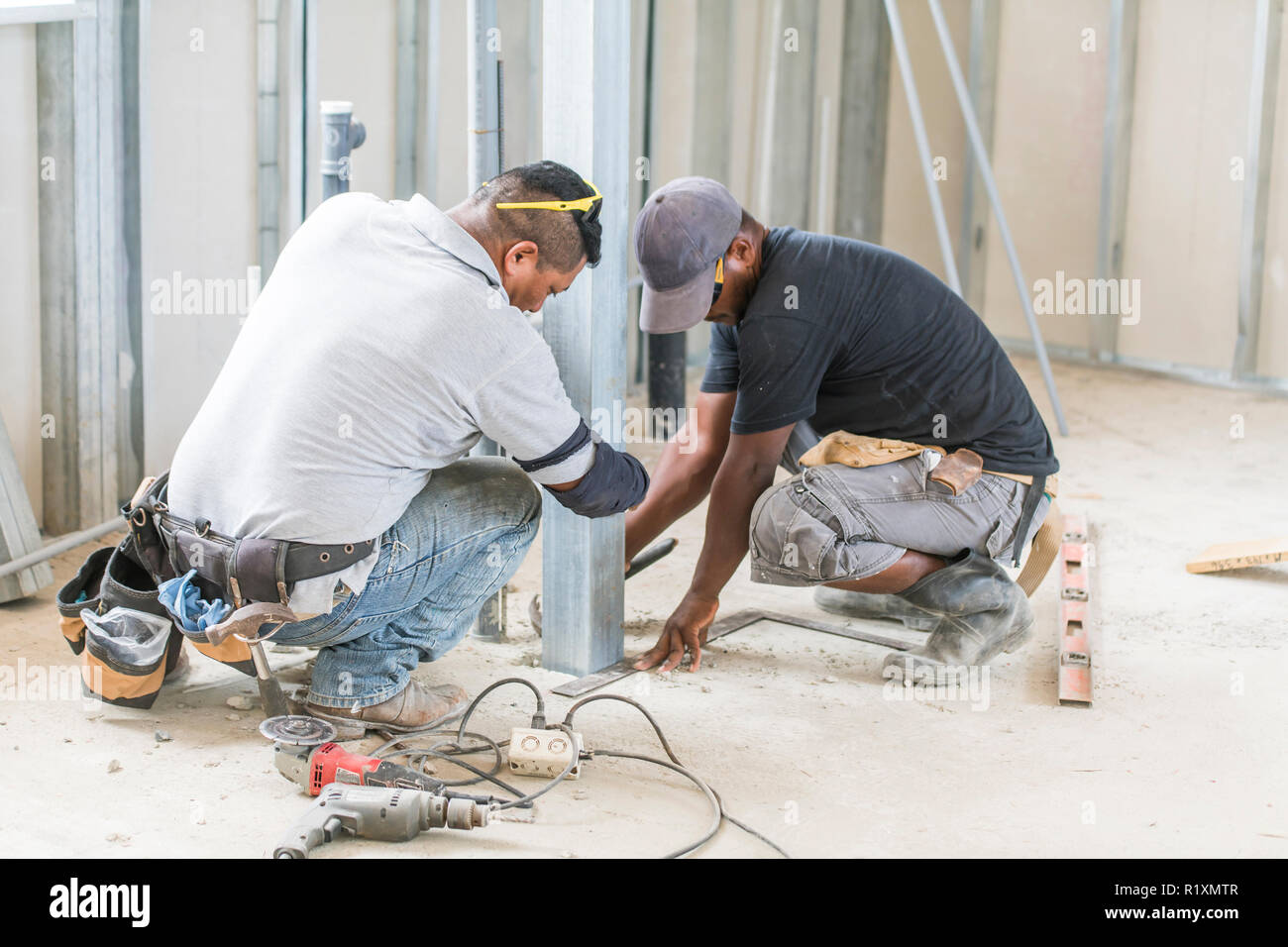 A house construction african at work industry Stock Photo - Alamy
