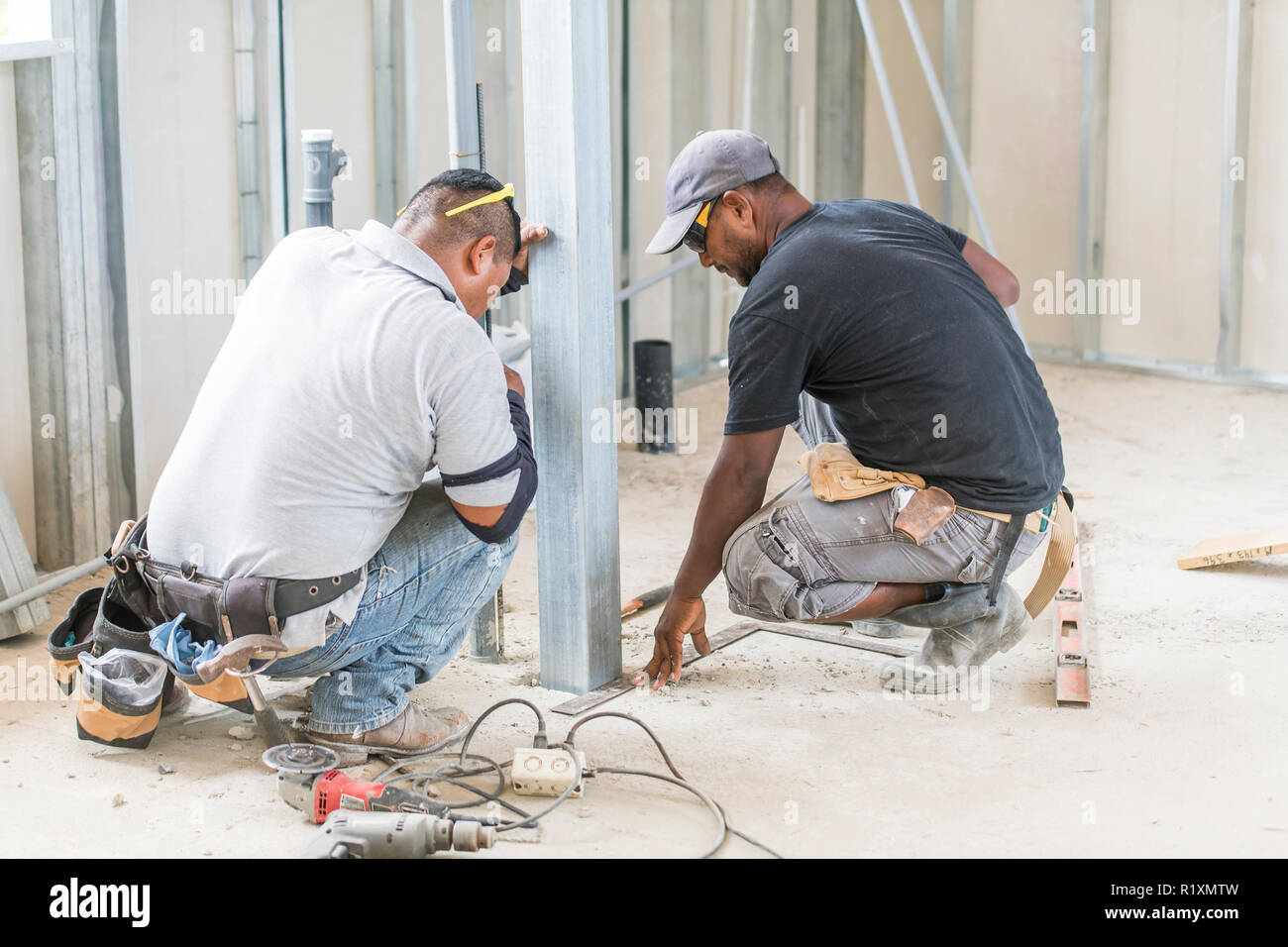 A house construction african at work industry Stock Photo - Alamy