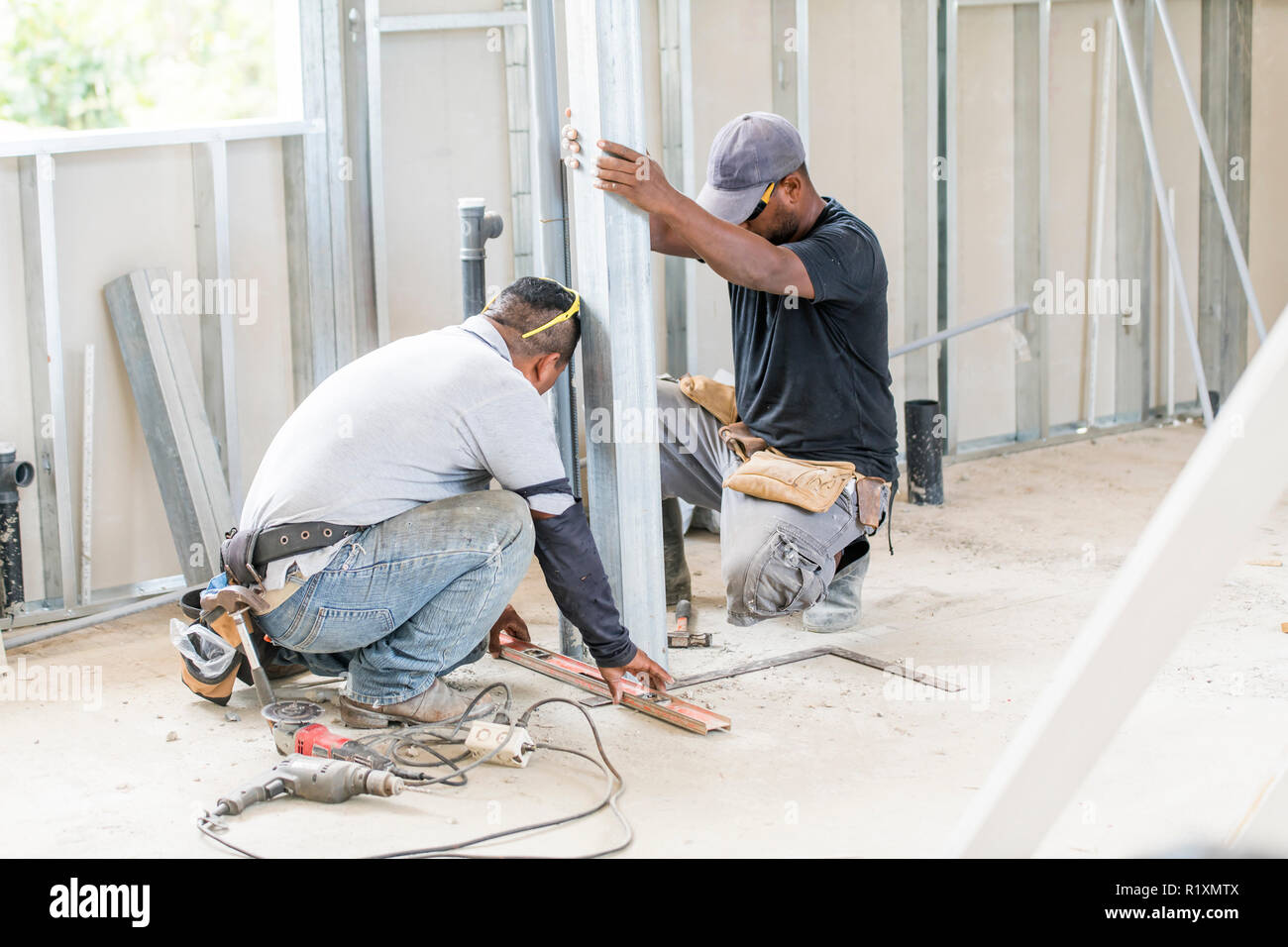 A house construction african at work industry Stock Photo - Alamy