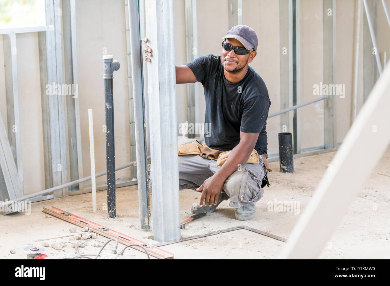 A house construction african at work industry Stock Photo - Alamy