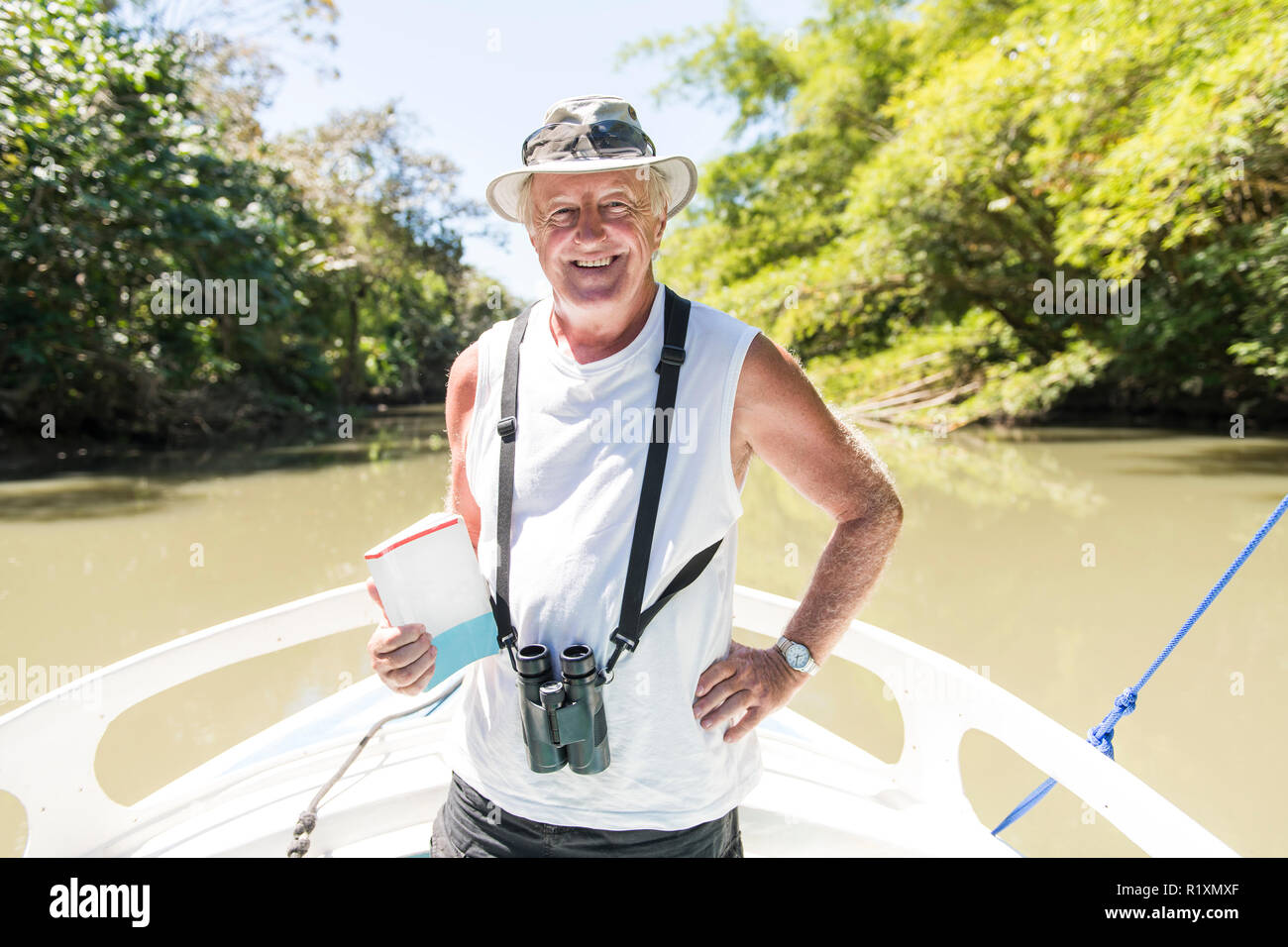 Mangrove nice excursion guide on boat Stock Photo - Alamy