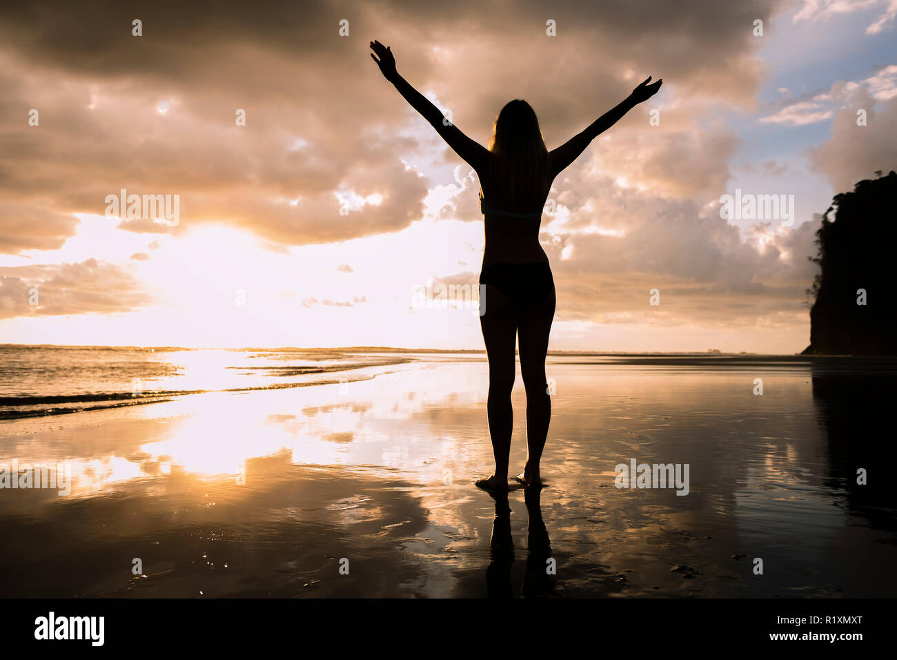 Loving life woman at the beach Stock Photo - Alamy